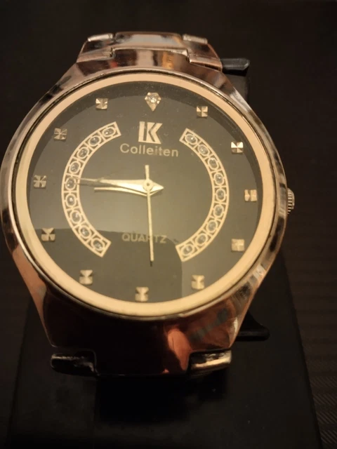 ANCIENNE MONTRE IK quartz (état voir photos ) fonctionne /pile neuve ...