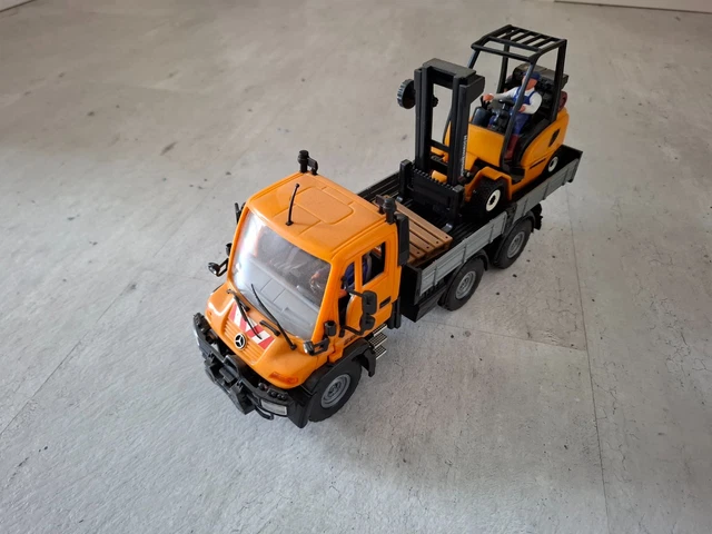 MERCEDES-BENZ UNIMOG U300 Pritsche mit Gabelstapler, 1:24, Dickie Toys ...