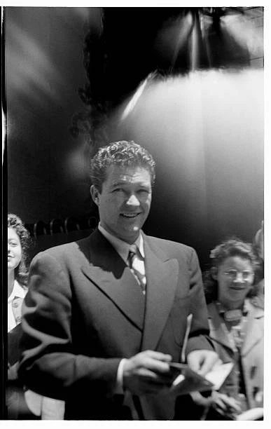 ACTOR DENNIS MORGAN Poses As He Signs His Autograph For Fans 1940s Old ...
