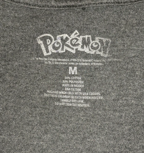 MAGLIETTA ALLENATORE NINTENDO Pokemon M Ash Ketchum Charizard Mew ...