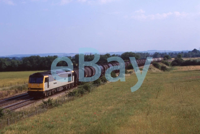 35MM RAILWAY SLIDE of Class 60 60048 June 1995 - Copyright to Buyer £4. ...