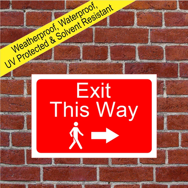 EXIT THIS WAY sign with a right facing arrow and pedestrian symbol ...