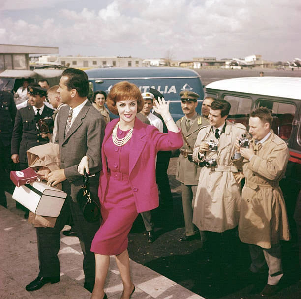 GINA LOLLOBRIGIDA AND her husband Milko Skofic arriving at Ciampin- Old ...
