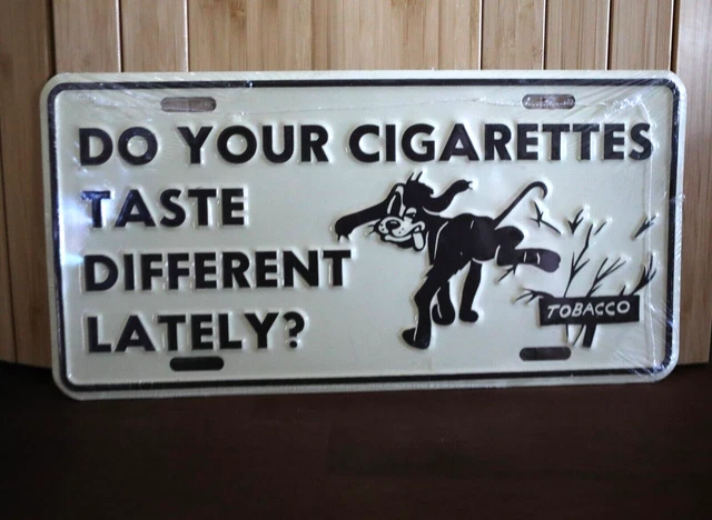 DO YOUR CIGARETTES Taste Different Lately Vanity License Plate NEW dog ...