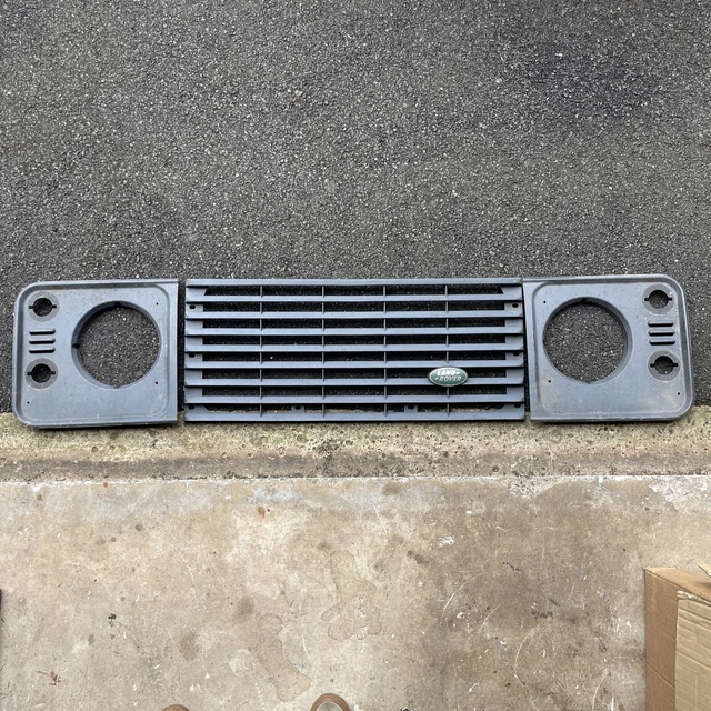 LAND ROVER DEFENDER 90/110/127/130 grille and headlamp surrounds. £50. ...