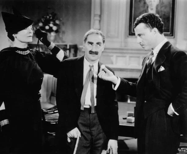 MARGARET DUMONT AS Emily Upjohn and Groucho Marx as Doctor Hugo- 1937 ...