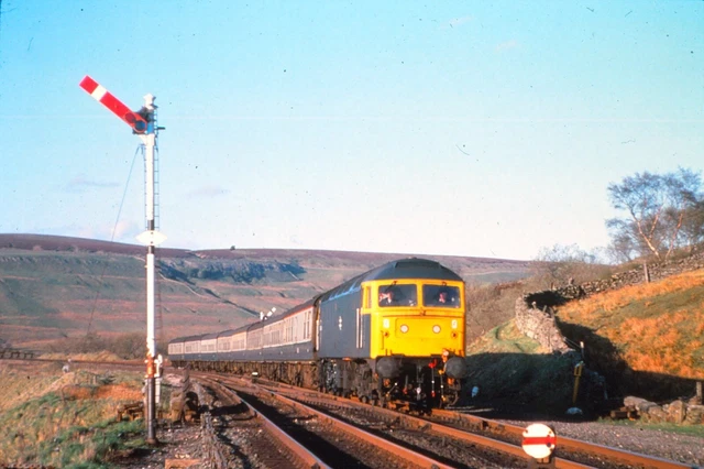 35MM SLIDE ORG+C/RIGHT BR DIESEL CLASS 47 452 EX WORKS BR BLUE SETTLE ...