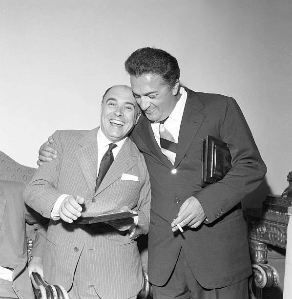 ITALIAN DIRECTOR FEDERICO Fellini and Italian producer Carlo Ponti 1957 ...
