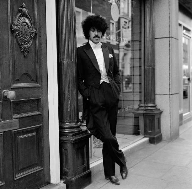 PHIL LYNOTT OF Thin Lizzy modelling clothes from Saville Row, Lond ...