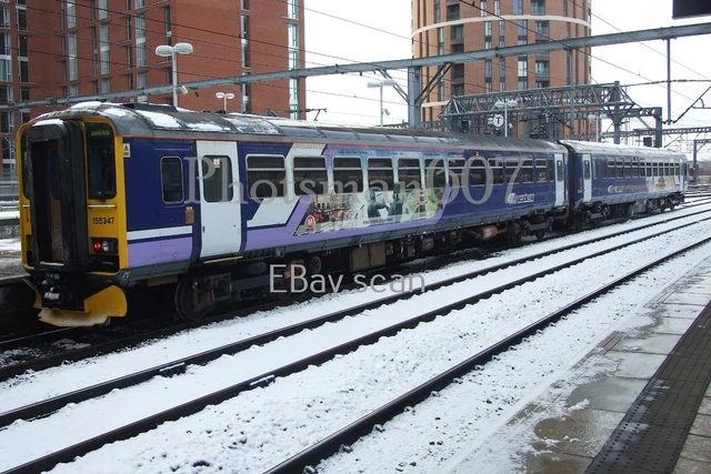 CLASS 155 155347, 2 car DMU, in old Northern with vinyls in snow ...