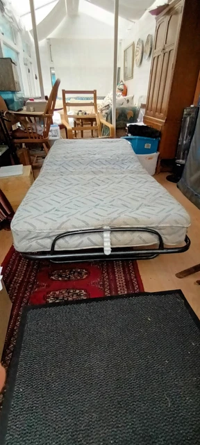 Z BED SINGLE folding, black metal frame with raisable head. Good ...