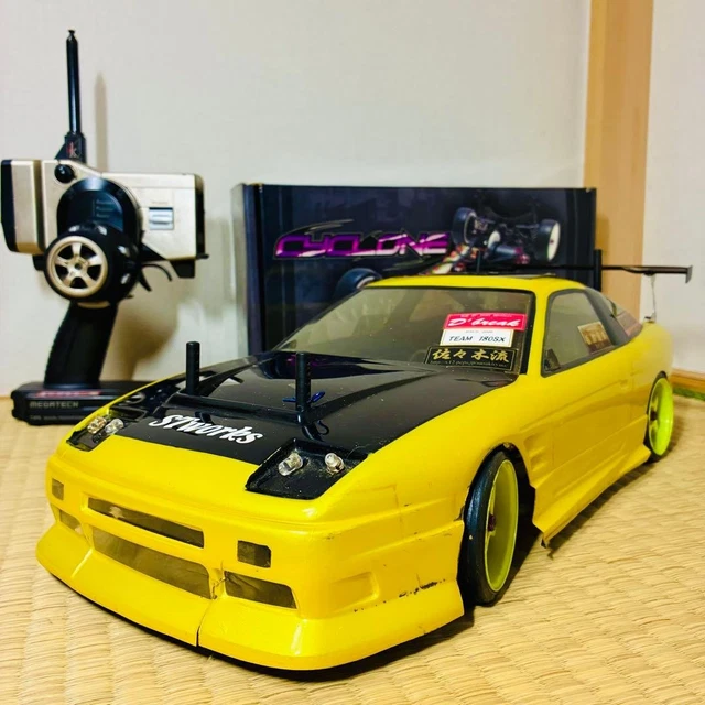 HPI RACING RADIO-CONTROLLED car bone chassis / 180SX-style yellow body ...