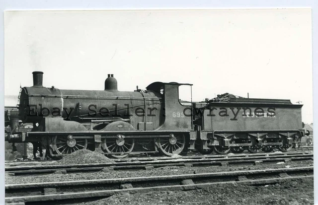 RAILWAY PHOTO: SR ex LSWR 700 0-6-0 699 at Nine Elms 1950 BR [L2171] £1 ...