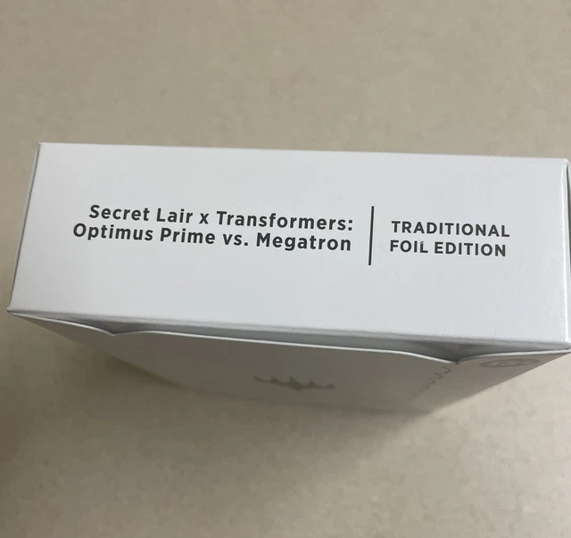 SECRET LAIR X Transformers: Optimus Prime vs. Megatron Foil Edition EUR ...