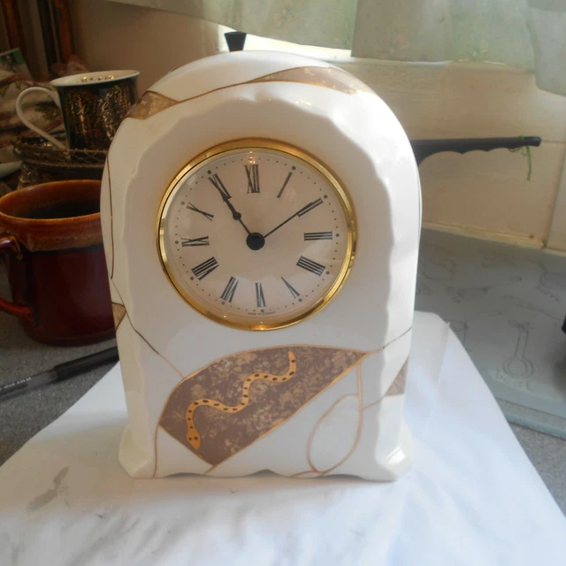VINTAGE ROYAL TARA mantel clock, 8 1/4" high, (scratch to decoration) £ ...