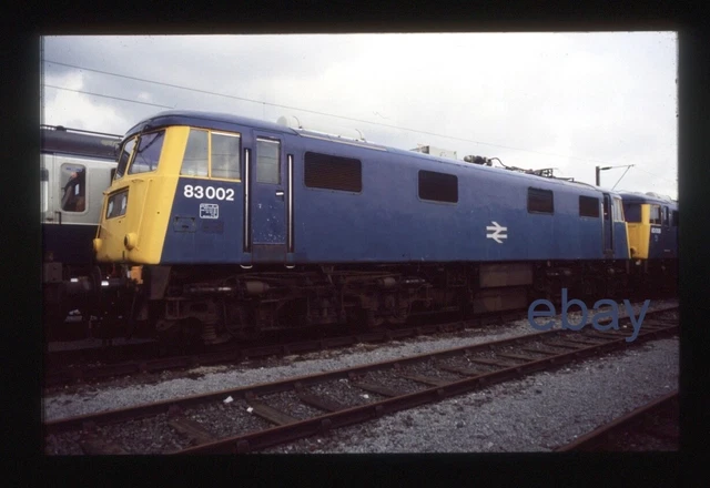 ORIGINAL 35MM SLIDE - AC Electric 83002 stored at Longsight on 9.4.83 ...