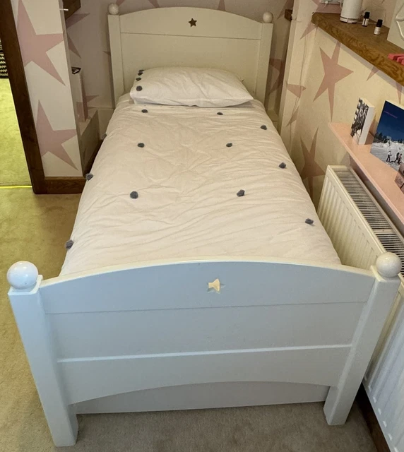 Feather and black trundle bed store