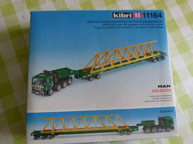 KIBRI 11164 MAN Schwerlastzugmaschine mit Teleskopbaggerbrücke Bausatz ...