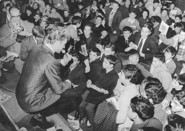 FRENCH SINGER & actor Johnny Hallyday signs autographs young fa- 1962 ...