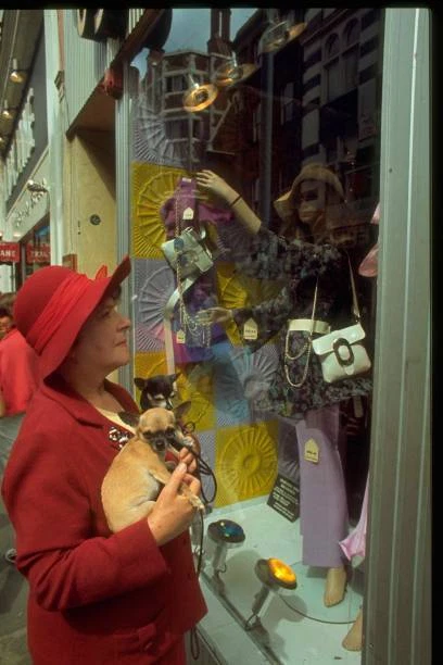 ACTRESS IRENE HANDL looking at a window display in Soho London 1970 Old ...