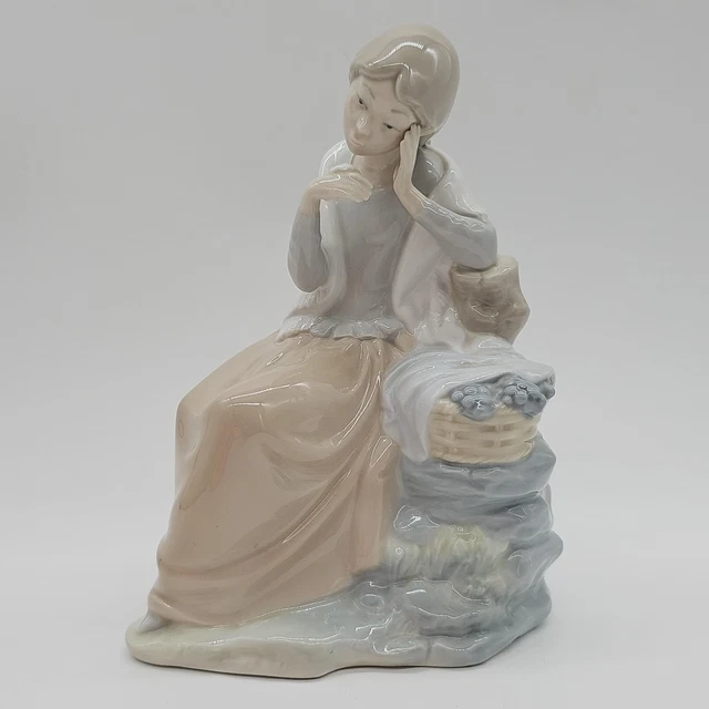 LLADRO / NAO Sad Girl Figurine Of A Young Girl Sitting With A Basket Of ...