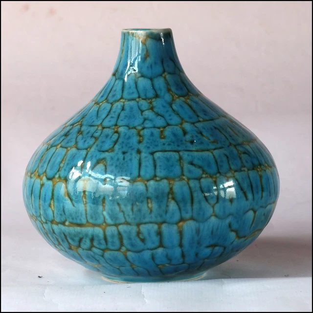 AN EARLY 1960S rare piece of Poole Studio - vase with the TV mark £125. ...