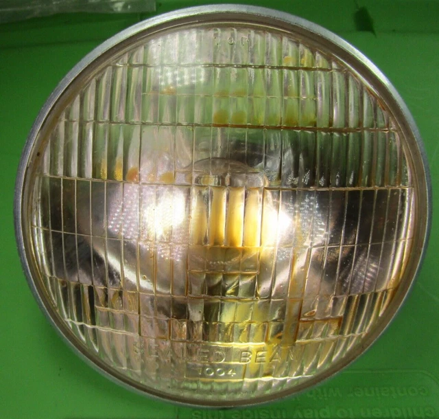 HONDA SPORT 250 Headlight 6v 35/25 watt🔥6 1/2" od🔥Has Yellow stuff ...