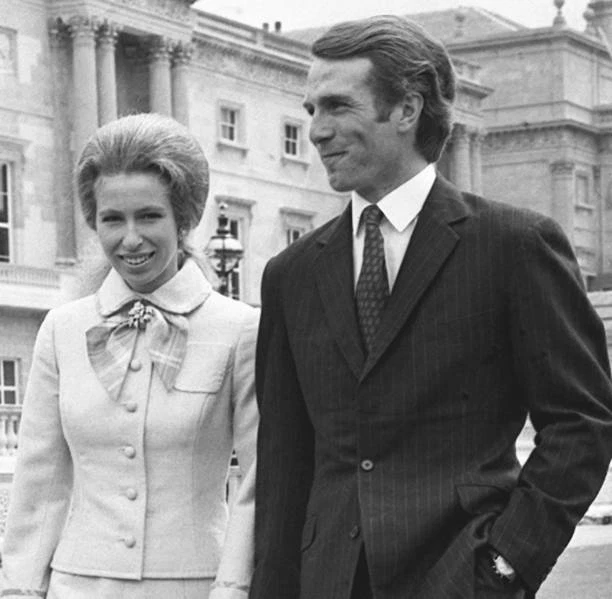 PRINCESS ANNE AND Lieutenant Mark Phillips walk the grounds of- 1977 ...