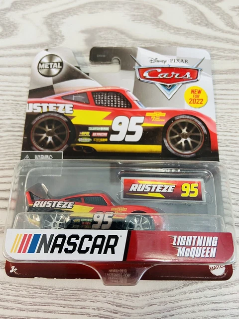 MATTEL DISNEY PIXAR Cars NASCAR Lightning McQueen Rusteze 95 Nuovo per ...