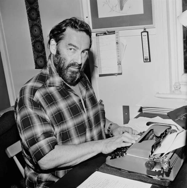 BRITISH NOVELIST AND Writer John Boland Seated With A Typewriter 1964 ...