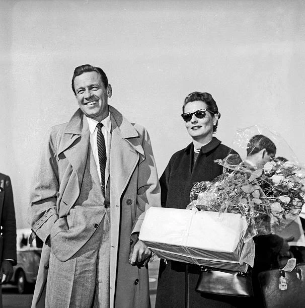 WILLIAM HOLDEN WALKING Ciampino airport with wife Brenda Marshall 1957 ...