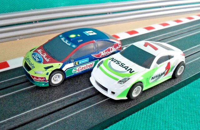 MICRO SCALEXTRIC 1:64 12V Slot Cars Nissan 350Z & Ford Focus RS WRC ...
