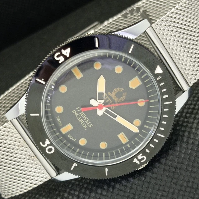 OROLOGIO SVIZZERO MECCANICO TITUS WINDING DA POLSO QUADRANTE NERO 583d ...