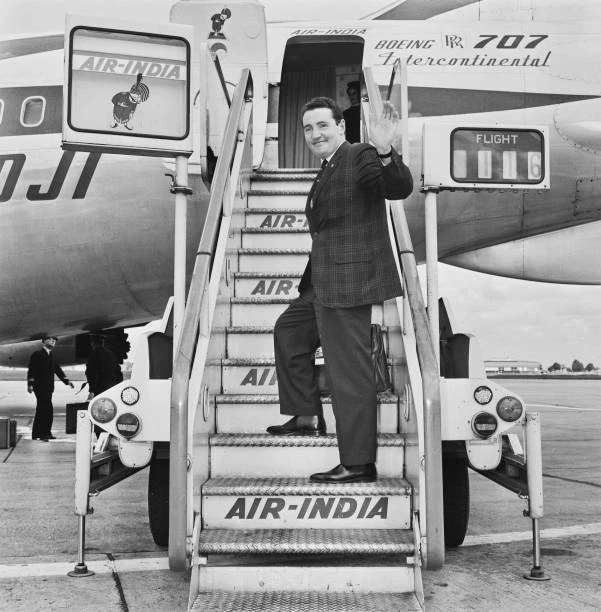 IRISH RALLY DRIVER Paddy Hopkirk boards an Air India aircraft 1960s OLD ...