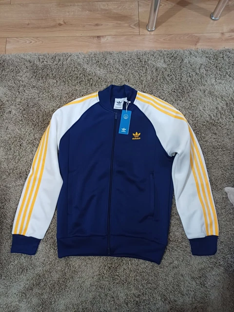 ADIDAS ORIGINALS ADICOLOR Classics+ SST Track Top in Blue and Yellow ...