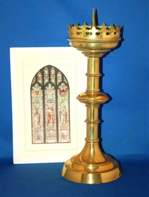 A LARGE ANTIQUE medieval gothic style pricket candlestick, brass ...
