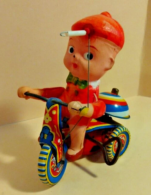 VINTAGE CELLULOID BOY on Bell Cycle Wind up Tin Litho toy by SUZUKI ...