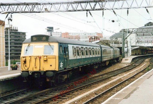 RAILWAY PHOTO 6X4 Class 304 EMU 304024 departs Manchester Piccadilly ...