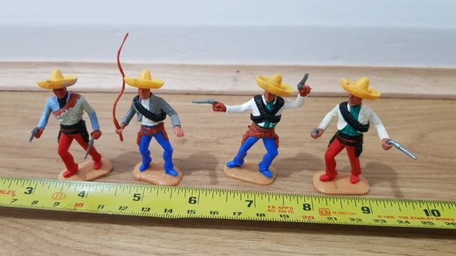 VINTAGE TIMPO PLASTIC figures cowboys standing x4 some repainting £12. ...