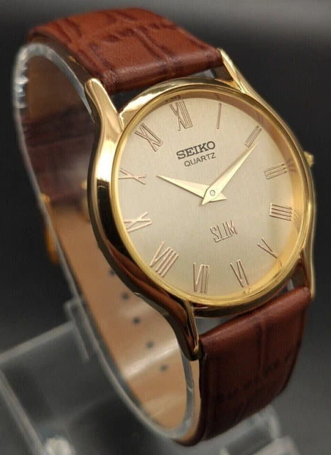 Seiko Slim Quartz Cadran Doré Bracelet Marron Boîtier 33 Mm Montre