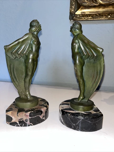 MAX LE VERRIER (1891-1973) Paire de serre-livres en fonte d'art patine ...