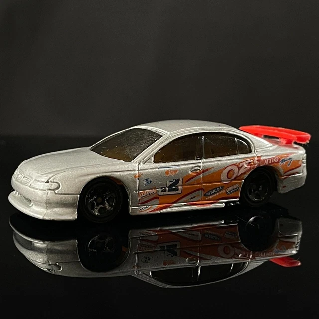 JUGUETE FUNDIDO A presión Hot Wheels Holden SS Commodore VT plateado ...