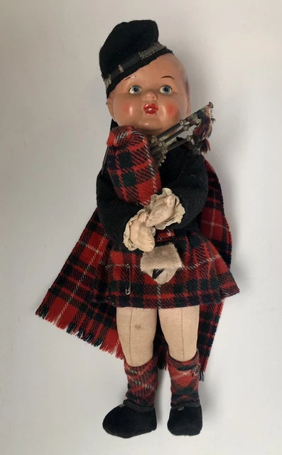 VINTAGE SCOTTISH HIGHLANDS Piper Doll with Full Costume & Bagpipes £14. ...
