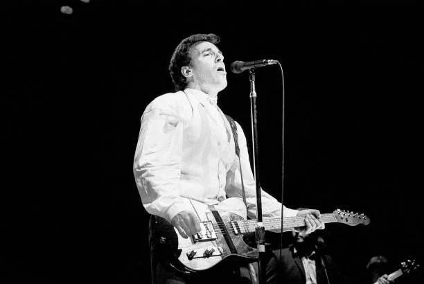 BRUCE SPRINGSTEEN PLAYS a Fender Telecaster electric guitar, as he Old ...