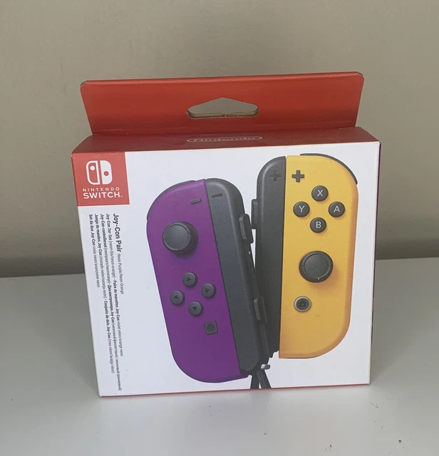 NINTENDO SWITCH JOY-CON Controller Pair - Neon Purple/Neon Orange £54. ...