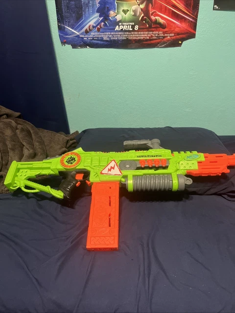 NERF REVOLTINATOR ZOMBIE Strike Toy Blaster with Motorized Lights ...