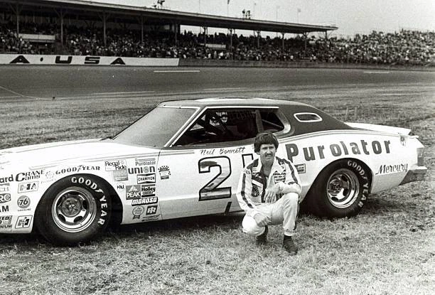 NEIL BONNETT OF Purolator poses for a photo prior to racing in the ...