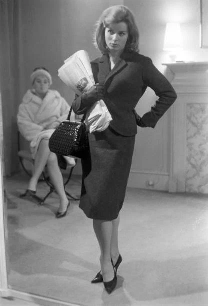 SENTA BERGER TRYING a dress in a tailor's shop in London In the ba- Old ...