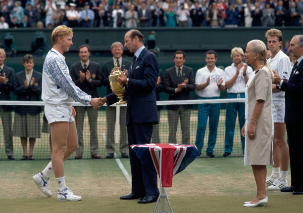BORIS BECKER OF West Germany receives the trophy for the Wimbledo - Old ...