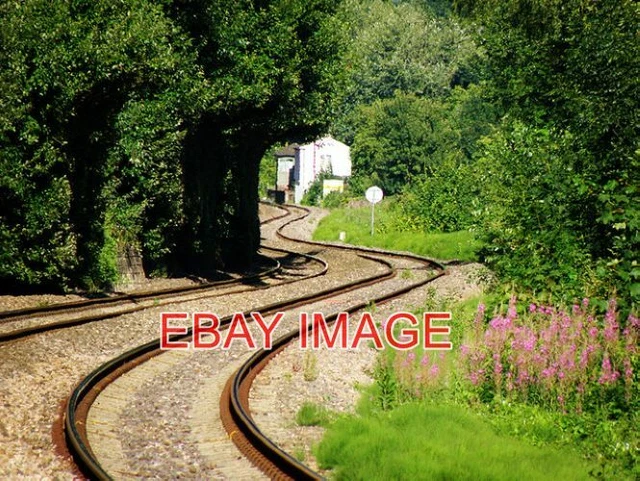 PHOTO THE Sweeping Curves Of The Railway Line As It Travels Down The ...